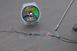 Super Seal Pli-Stix® 30' Medium Permanent Asphalt Crack Filler at Menards®