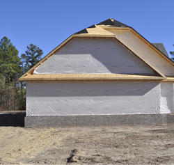 9' x 100' BLOCKADE Woven Housewrap at Menards®