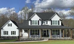 TimberCrest™ 7" x 10' Cobblestone Board and Batten Vinyl Siding at Menards®