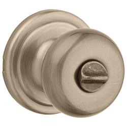 Kwikset® Juno Bed & Bath Privacy Door Knob in Antique Brass at Menards®
