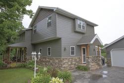 16' 8" Double 4" Colonial Red Steel Lap Siding at Menards®