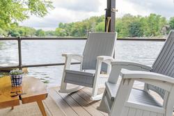 Suncast® Dove Gray/White Rocking Chair with Storage at Menards®