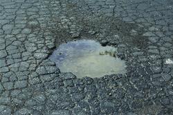 SealBest® Blacktop Pothole Patch - 50 lb. at Menards®