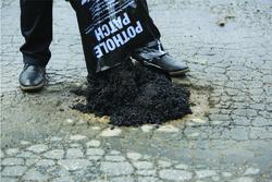 SealBest® Blacktop Pothole Patch - 50 lb. at Menards®