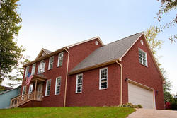 Novabrik 4" Walnut Split Face Brick Siding (105 sq ft) at Menards®