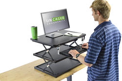 Uncaged Ergonomics® Black Adjustable Standing Desk at Menards®