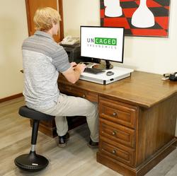Uncaged Ergonomics® Mini Adjustable Standing Desk Converter at Menards®