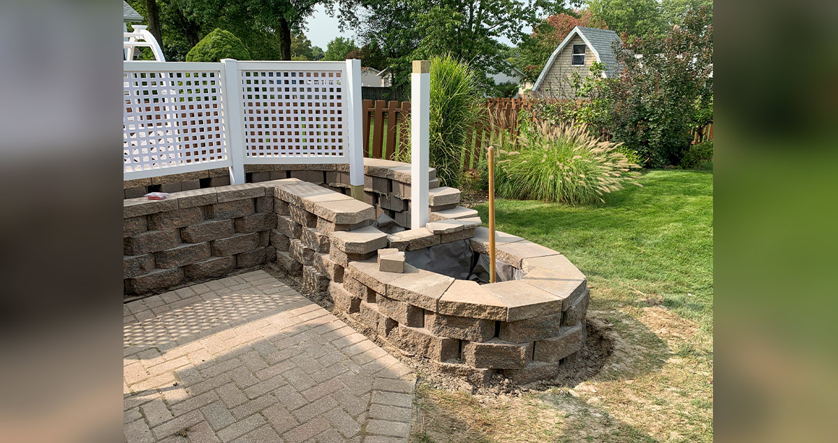Retaining Wall with Privacy Screen Planter - Project by Chase at Menards®