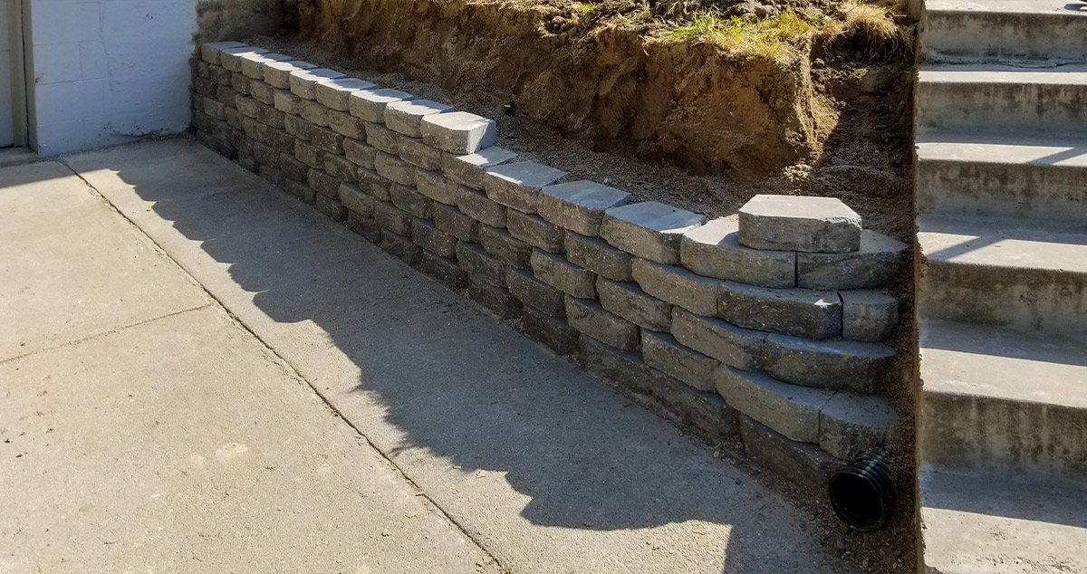 Wood to Block Retaining Wall - Project by Residental Refinement at Menards®